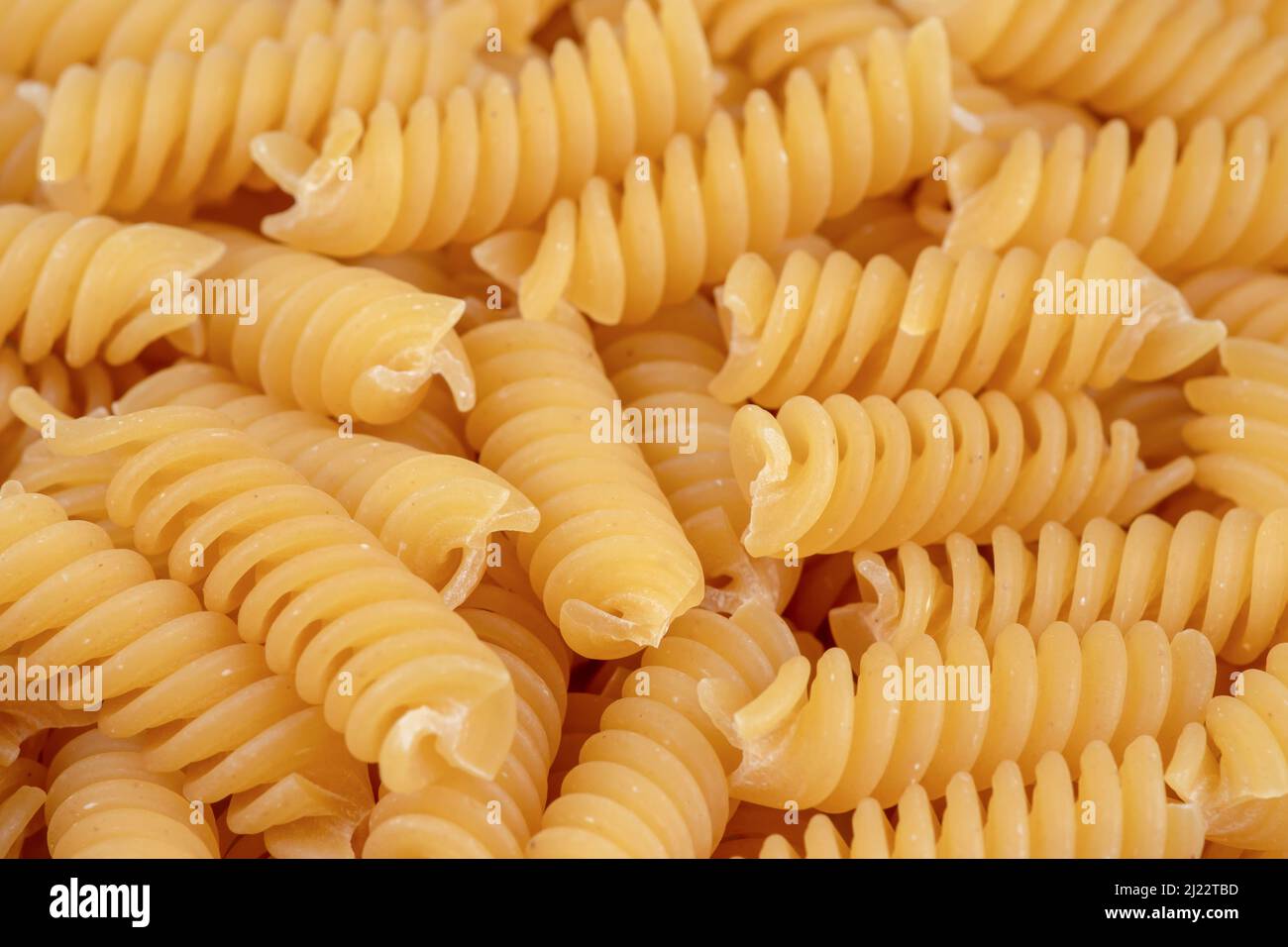Variety of types and shapes of dry Italian pasta. Close up Stock Photo ...