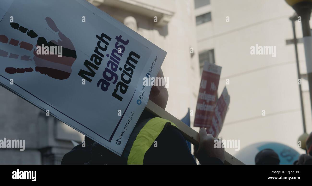 London, UK - 03 19 2022: A man at Portland Place holding a sign, ‘March ...