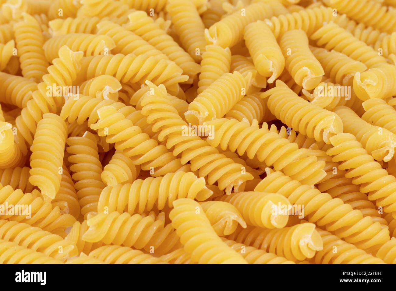 Variety of types and shapes of dry Italian pasta. Close up Stock Photo ...