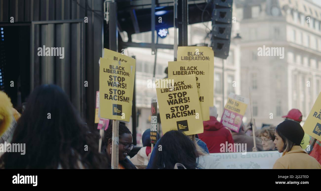London, UK - 03 19 2022: Group of women at Portland Place holding signs ...