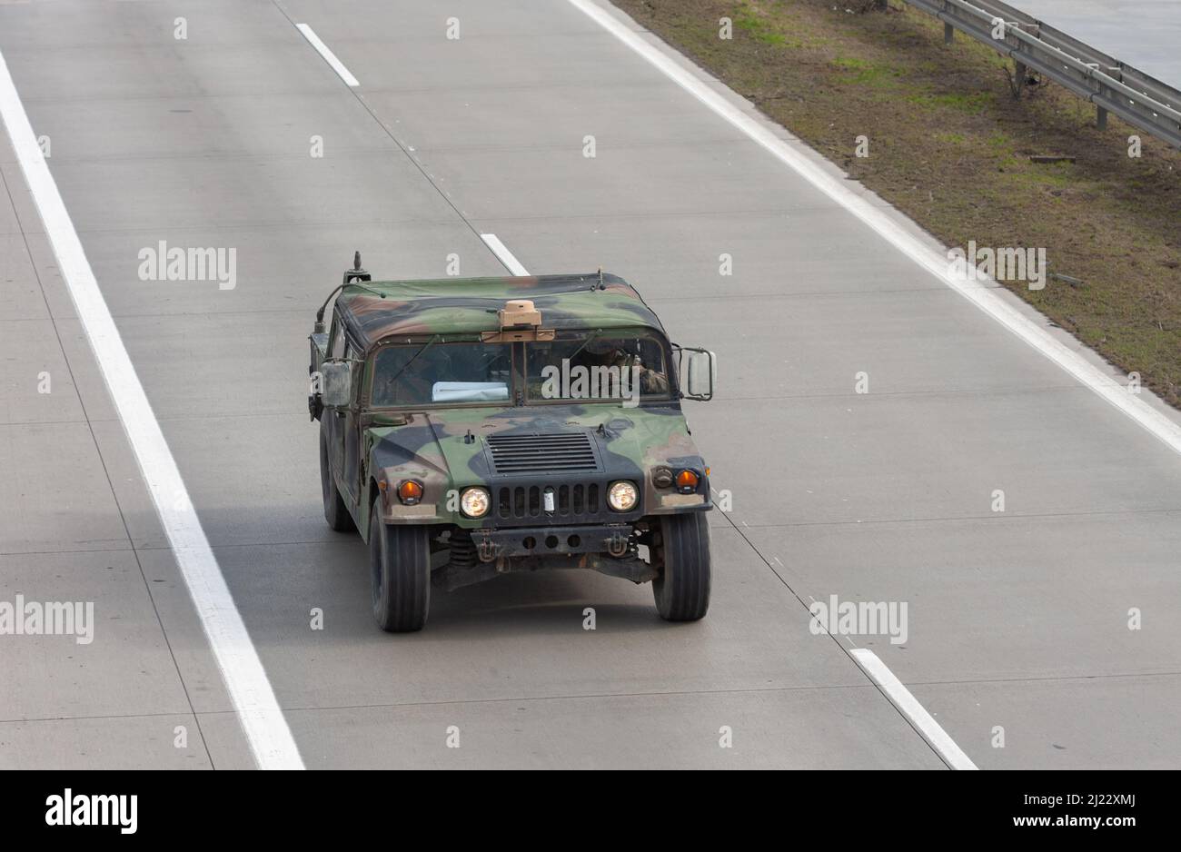 US army military convoy passes in Czech Republic. Humvee, high mobility ...