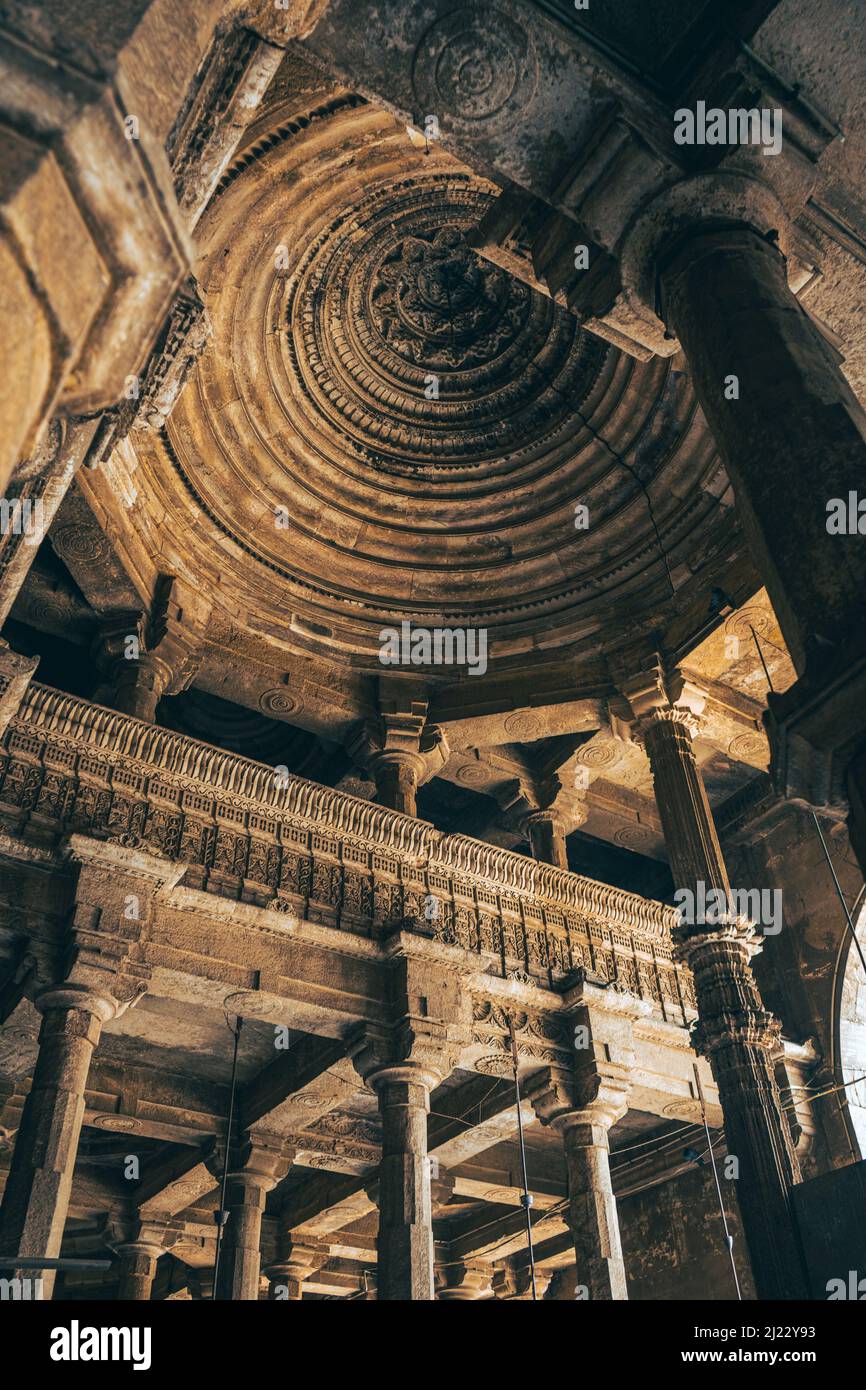 A vertical shot of a gothic architectural style building's ceiling ...