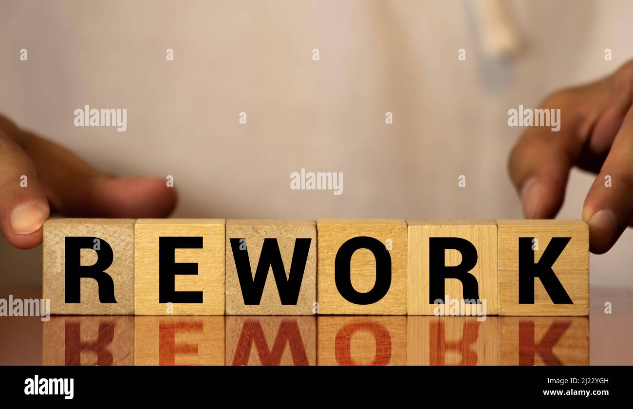 Alphabet letter block in word rework on wood background Stock Photo - Alamy
