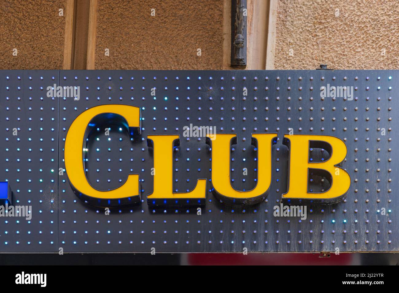 Big Yellow Sign Club at Led Lights Background Stock Photo - Alamy