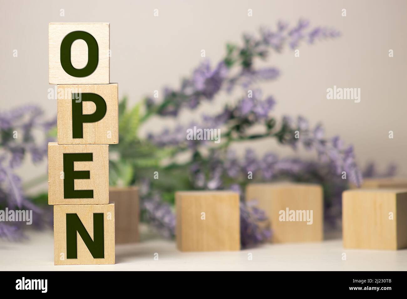 Word OPEN made with wood building blocks on a gray back ground Stock ...