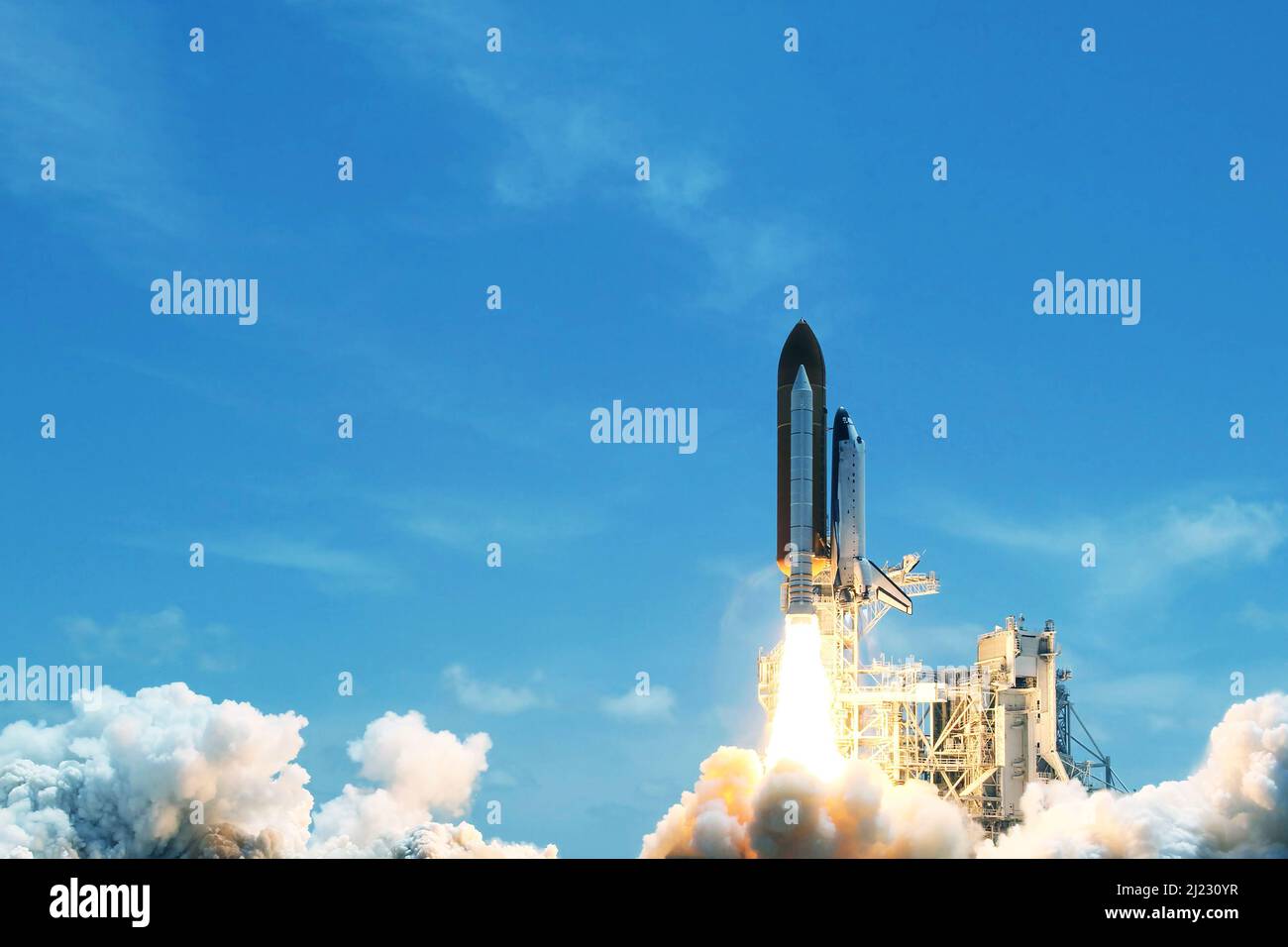 Rocket launch into space. Elements of this image furnished by NASA ...