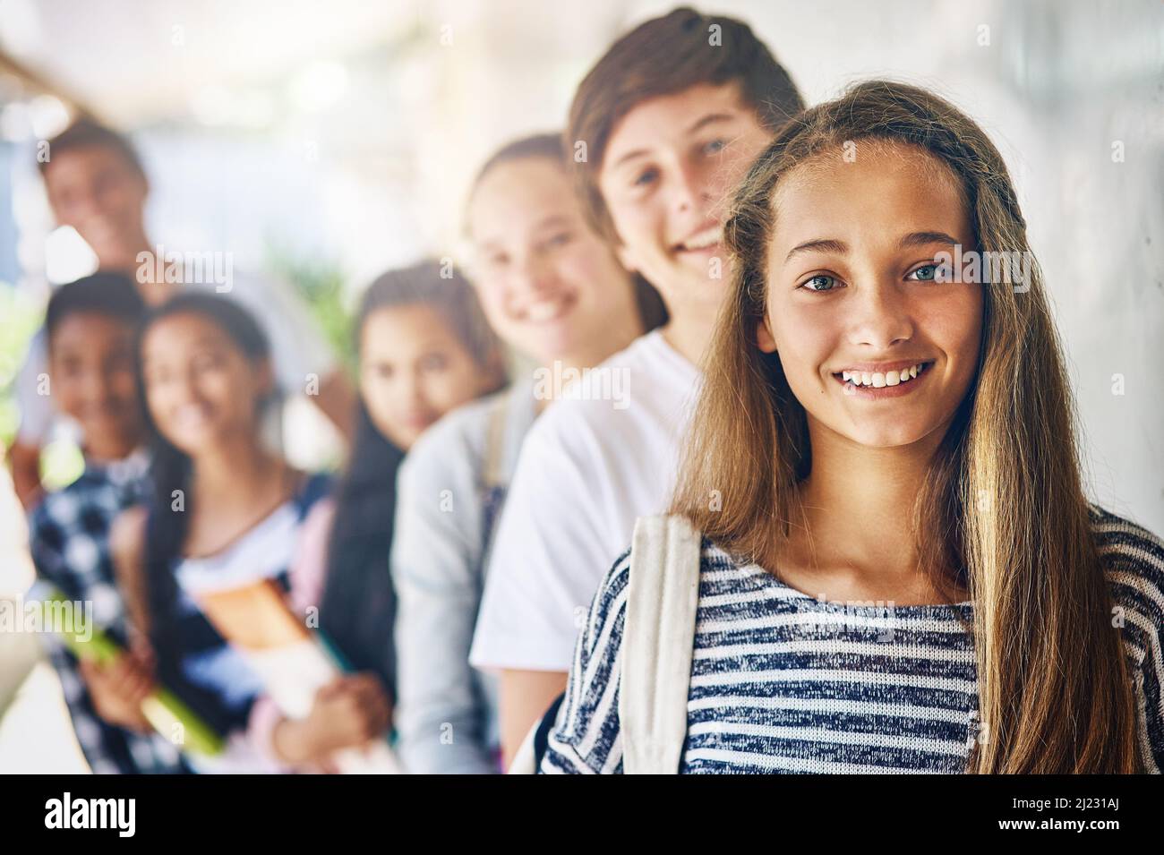 What will we learn today. Portrait of a group of happy schoolchildren ...