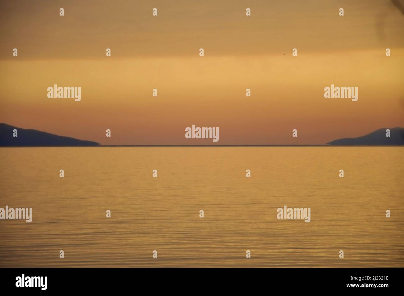 Horizontal line between sea and sky at sunset. Static minimalistic ...