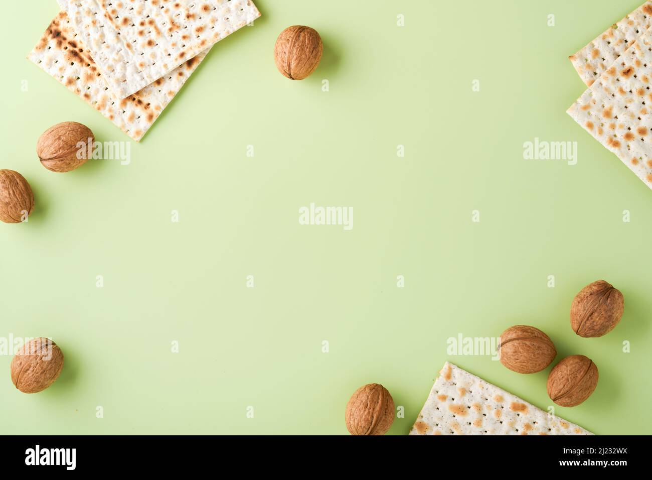 Passover celebration concept. Matzah, red kosher wine and walnut ...