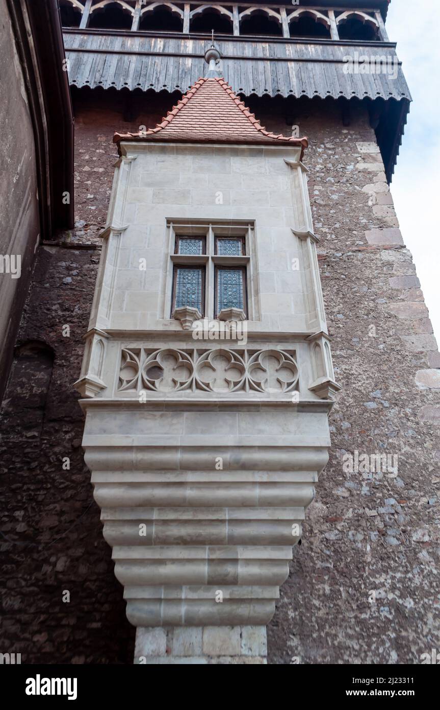 Beautiful design of a small window of a castle Stock Photo - Alamy