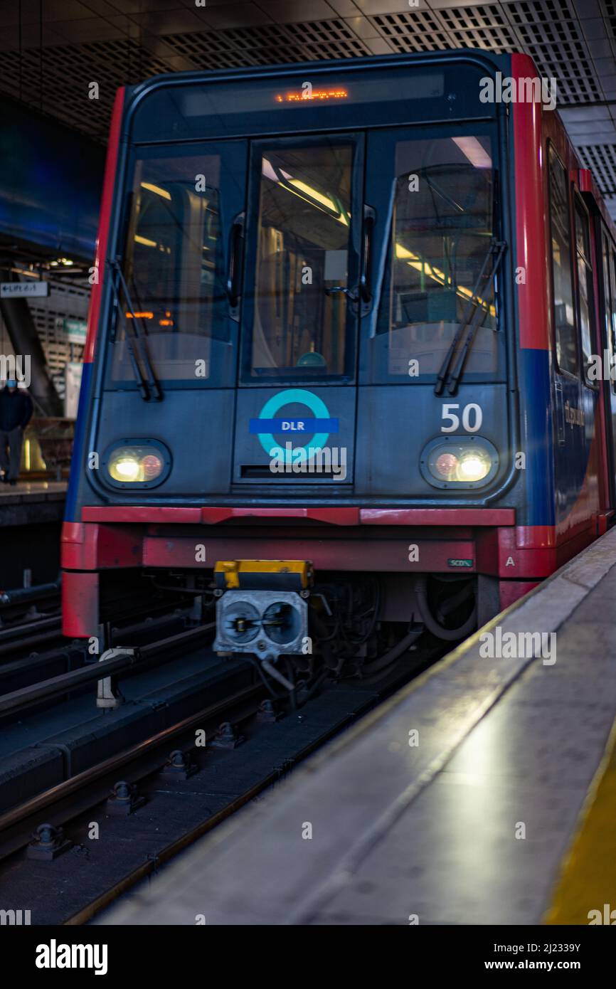 London DLR Train Pulling In To Station Stock Photo - Alamy