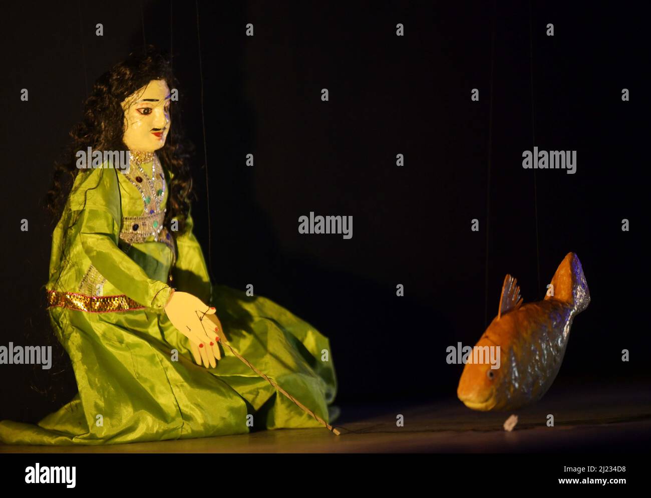 Puppetarians are performing with puppets on World Puppetry Day which is ...