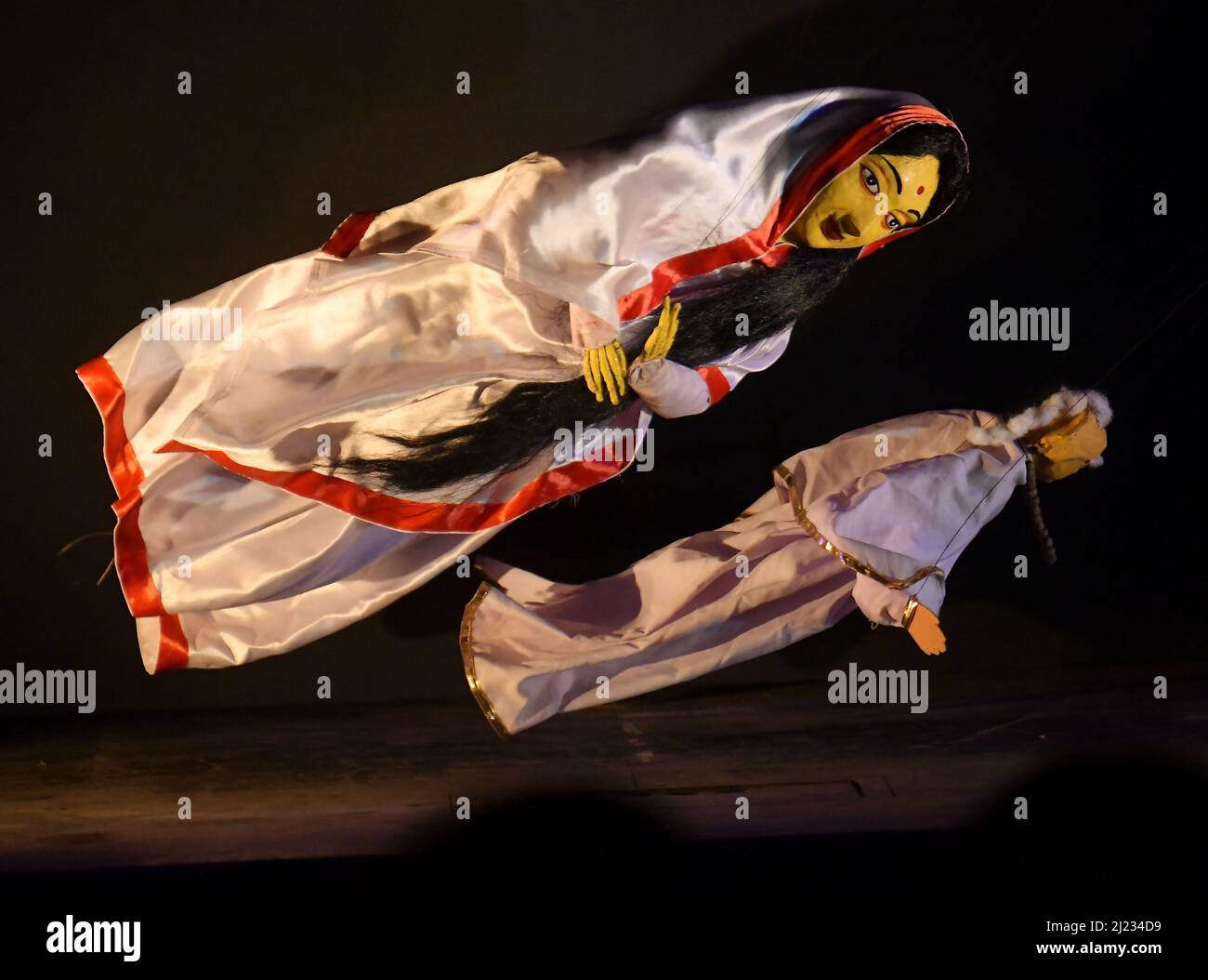 Puppetarians are performing with puppets on World Puppetry Day which is ...