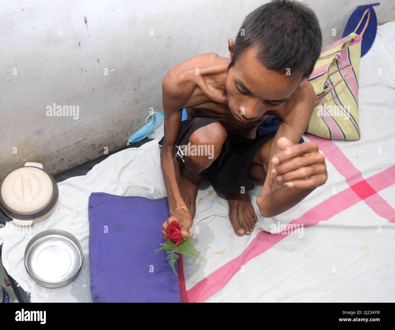TB (Tuberculosis) patients are seen with roses, which were given by ...