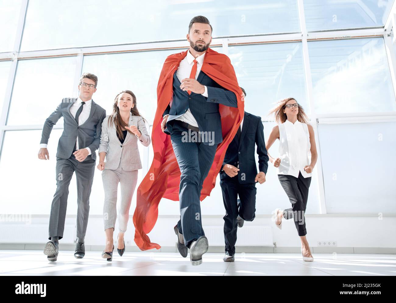 business team and their leader are decisively stepping forward Stock ...