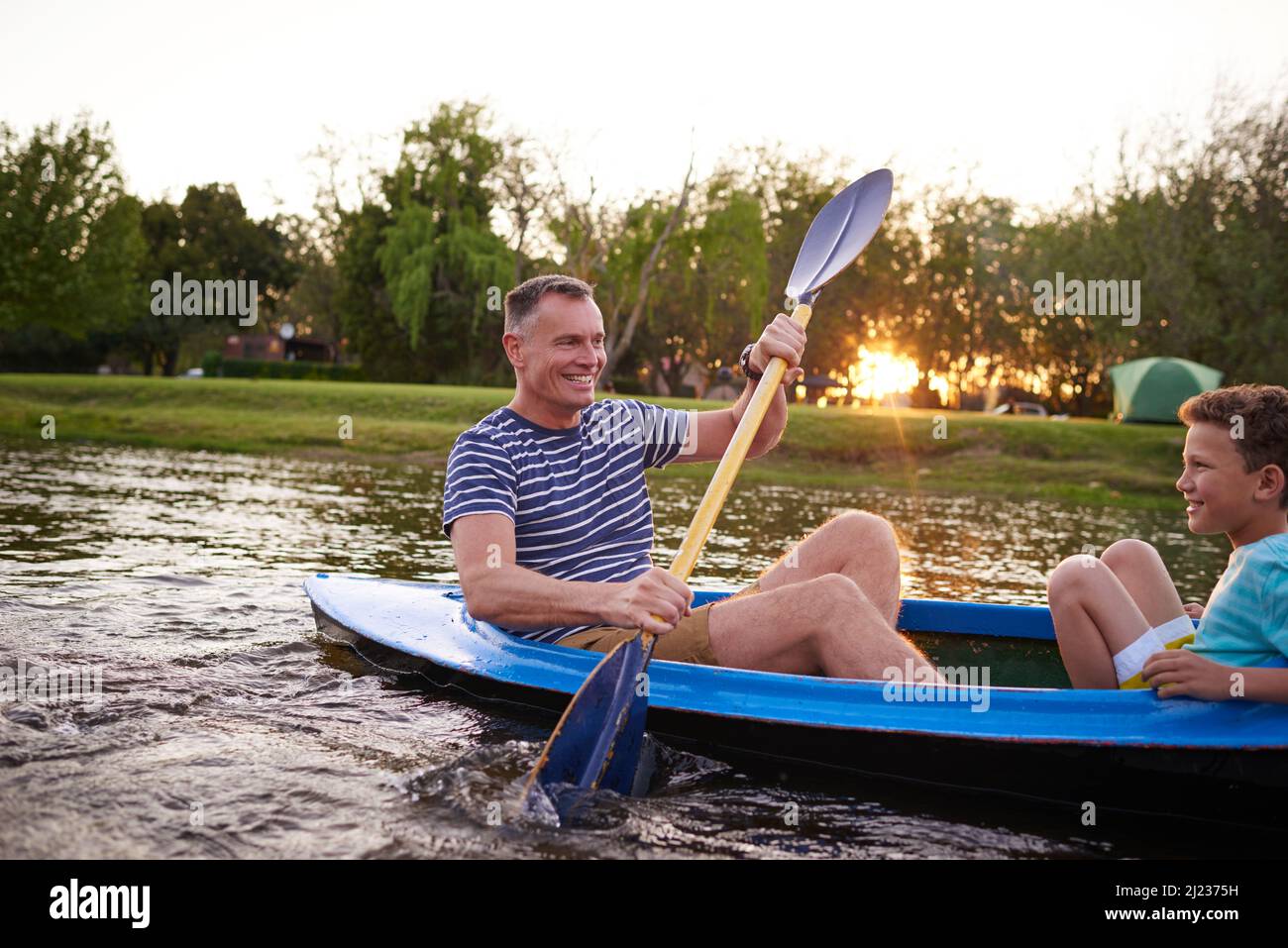 Two children on a rowing boat hi-res stock photography and images - Alamy