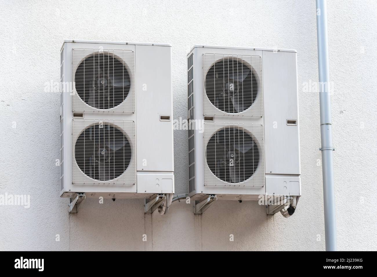 Air conditioner compressor outdoor unit installed outside the building ...