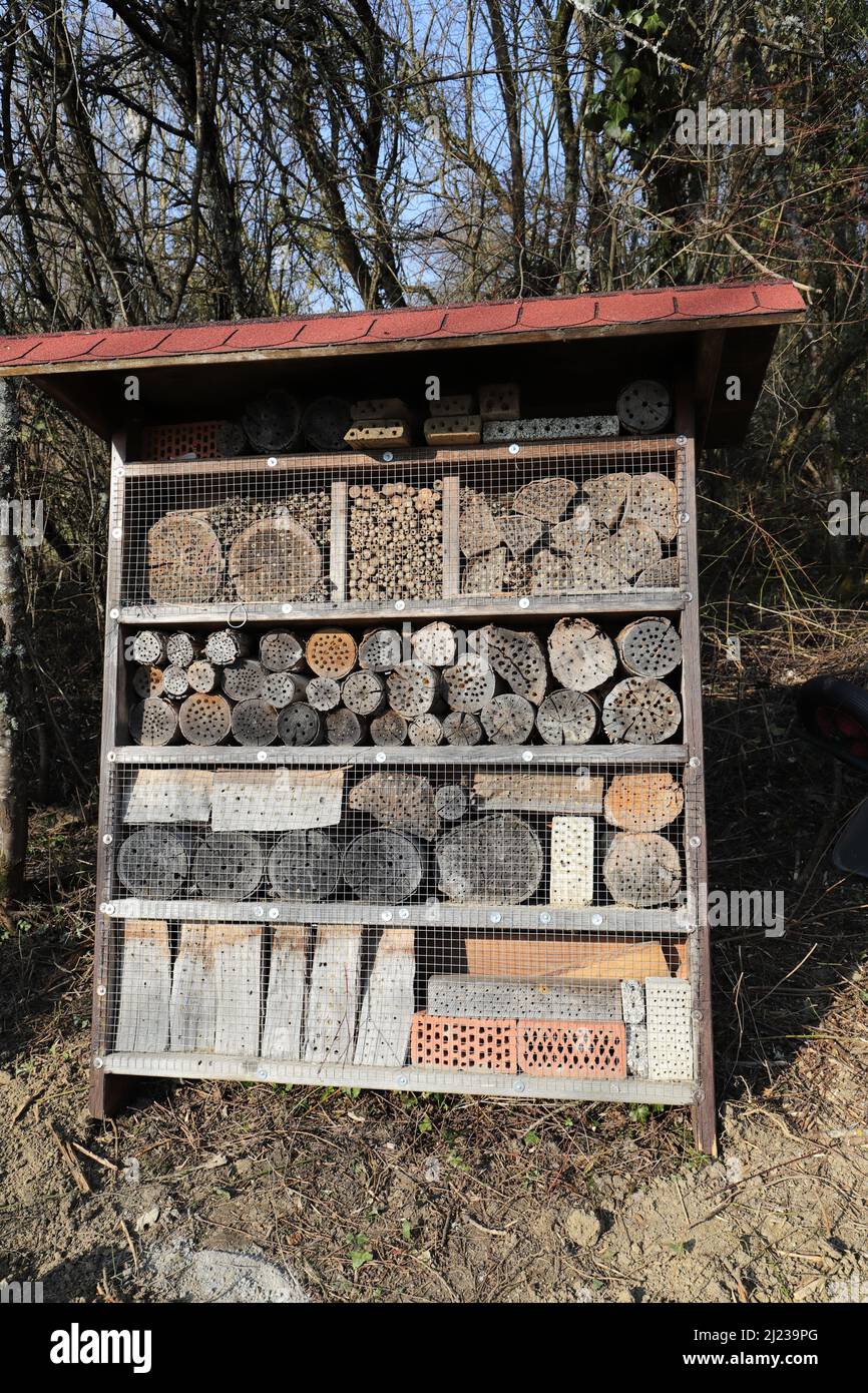 a large insect hotel in a meadow Stock Photo - Alamy