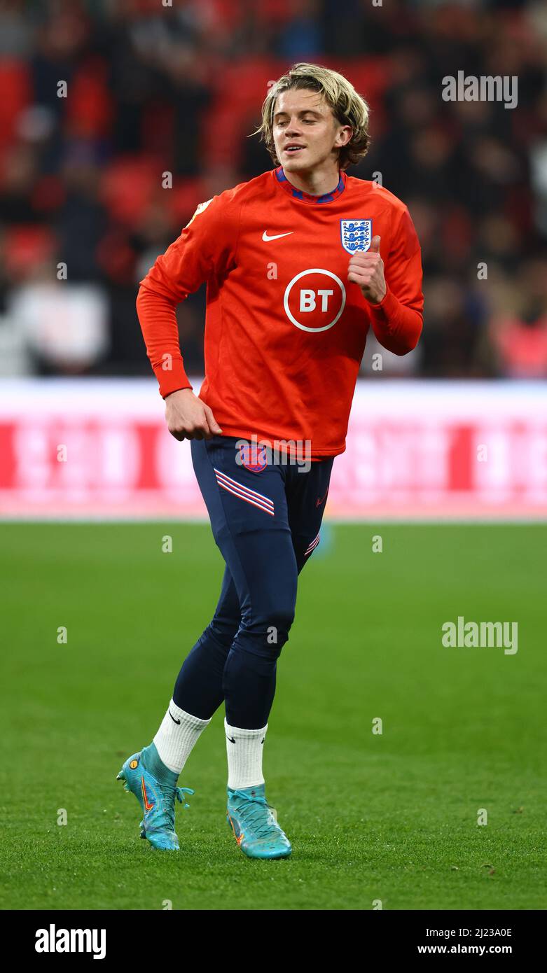 London, England, 29th March 2022. Conor Gallagher of England arms up ...