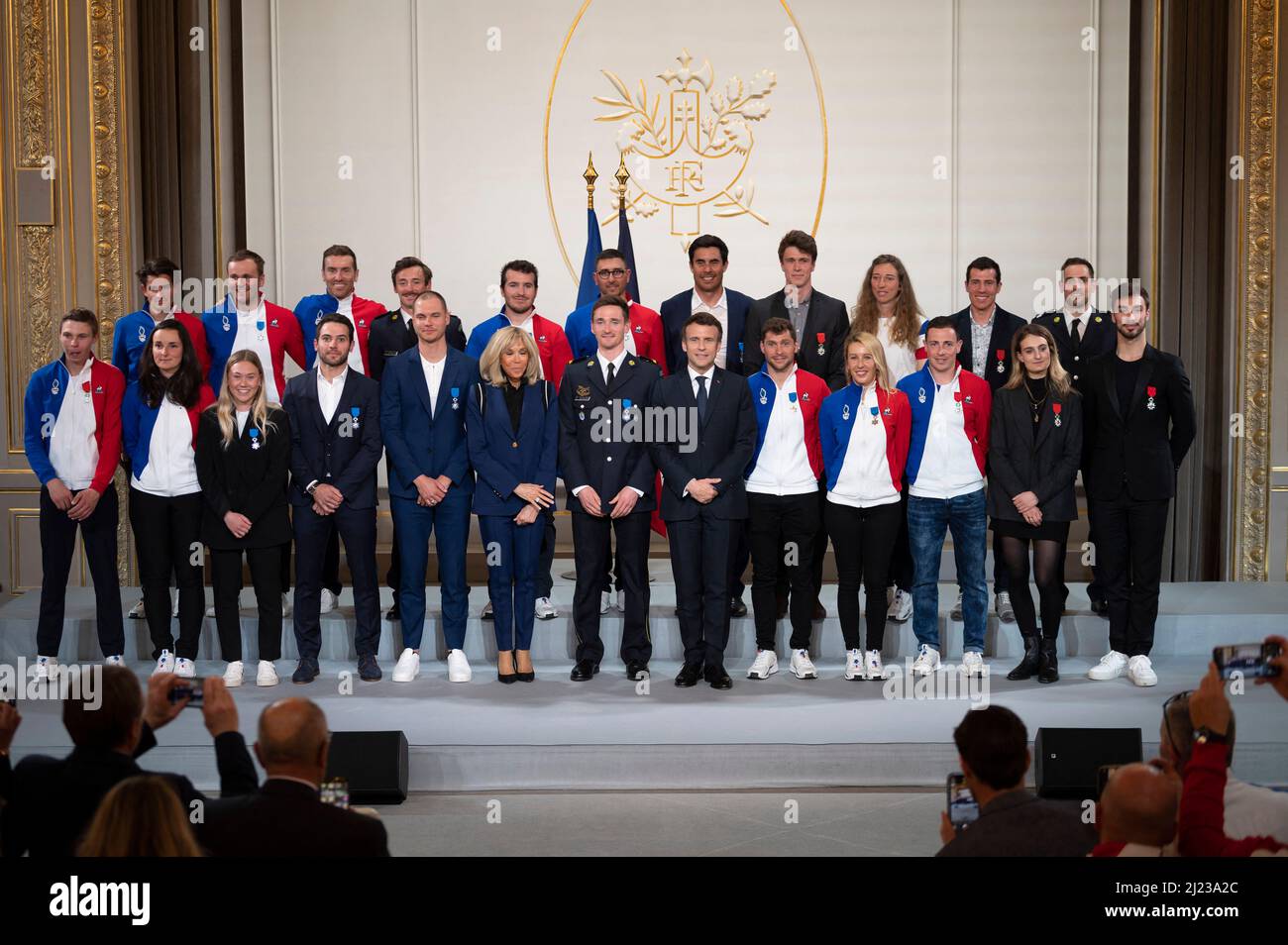 France's President Emmanuel Macron (C, R) and his wife Brigitte Macron ...