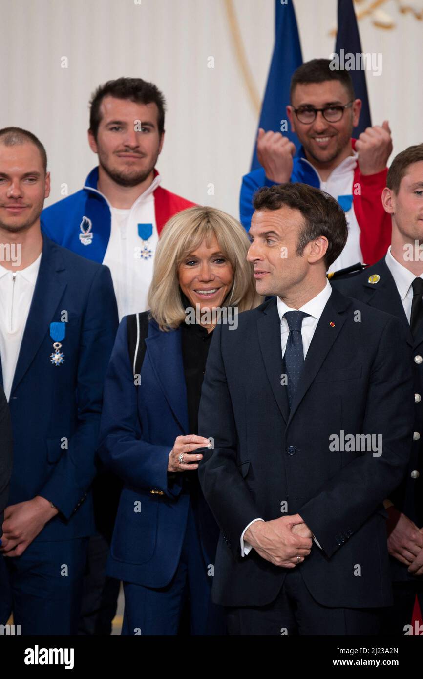 France's President Emmanuel Macron (C, R) and his wife Brigitte Macron ...