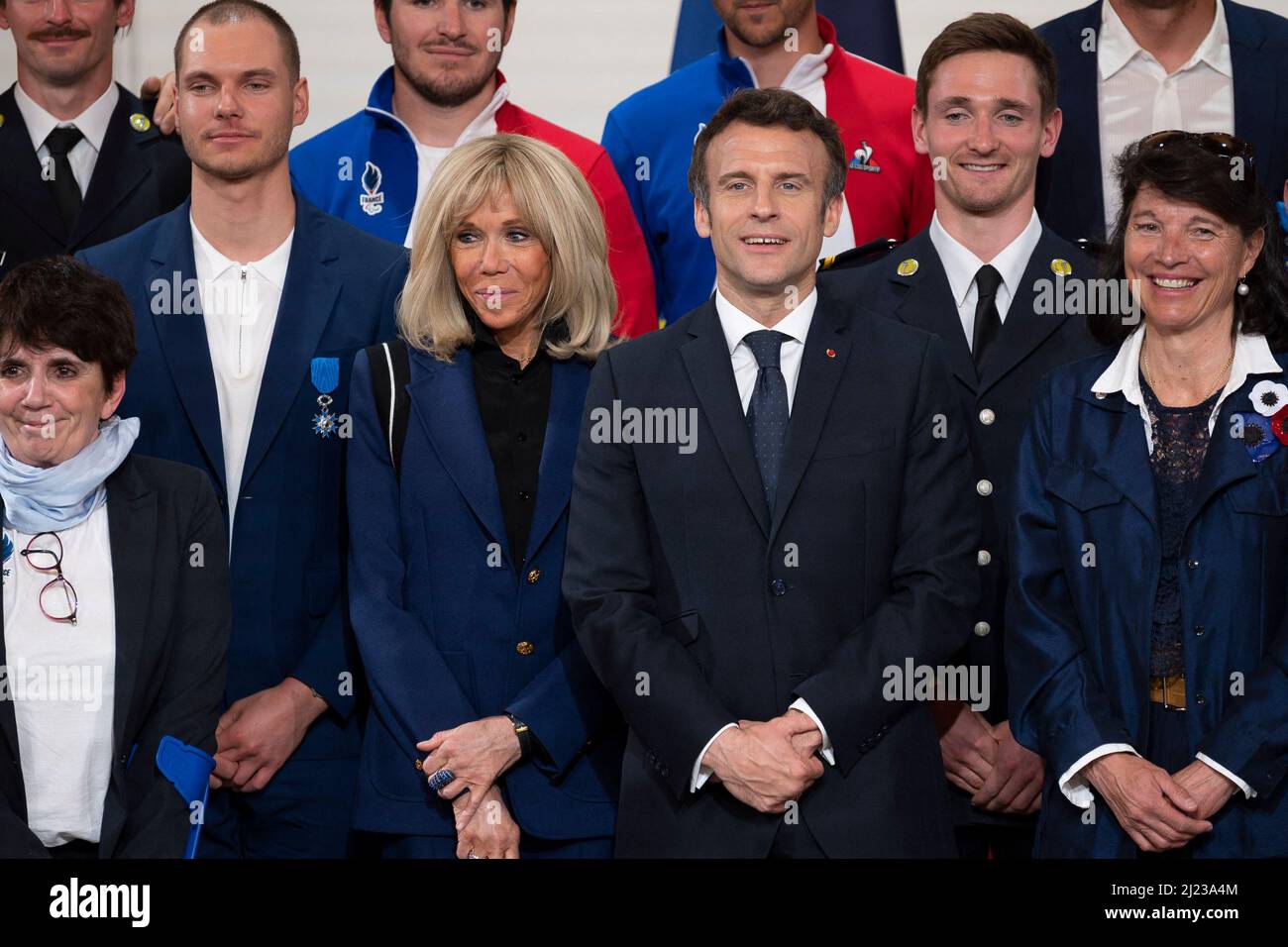 France's President Emmanuel Macron (C, R) and his wife Brigitte Macron ...
