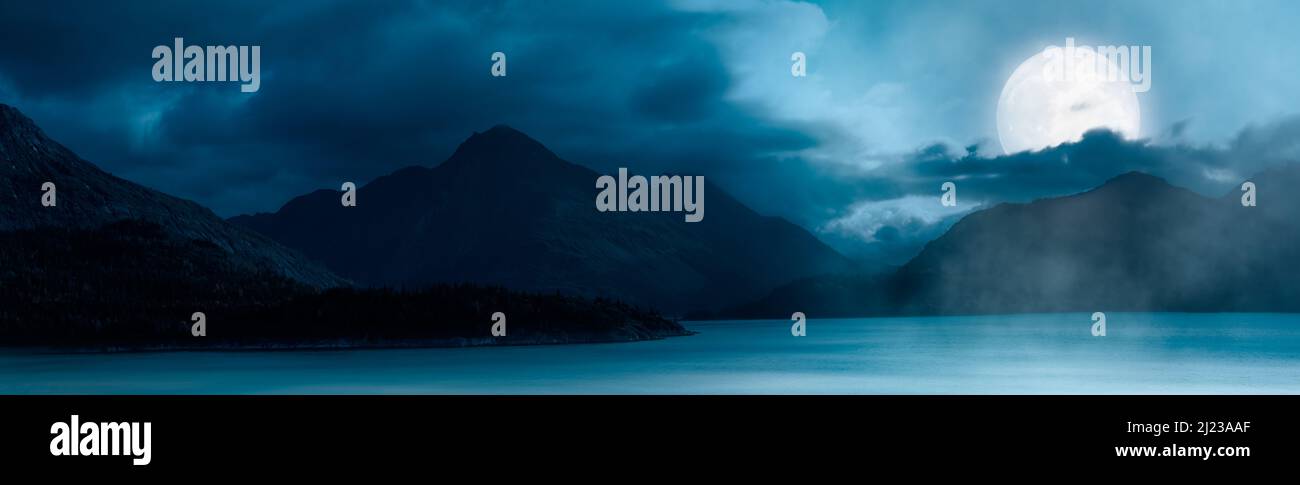 Magical Night Scene with Full Moon in cloudy sky Stock Photo - Alamy