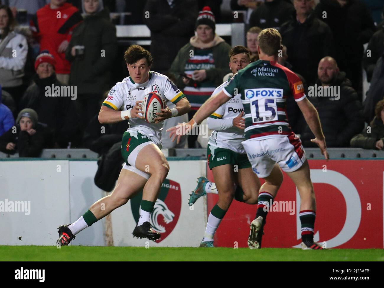 London Irish's Henry Arundell breaks through before scoring his side's ...