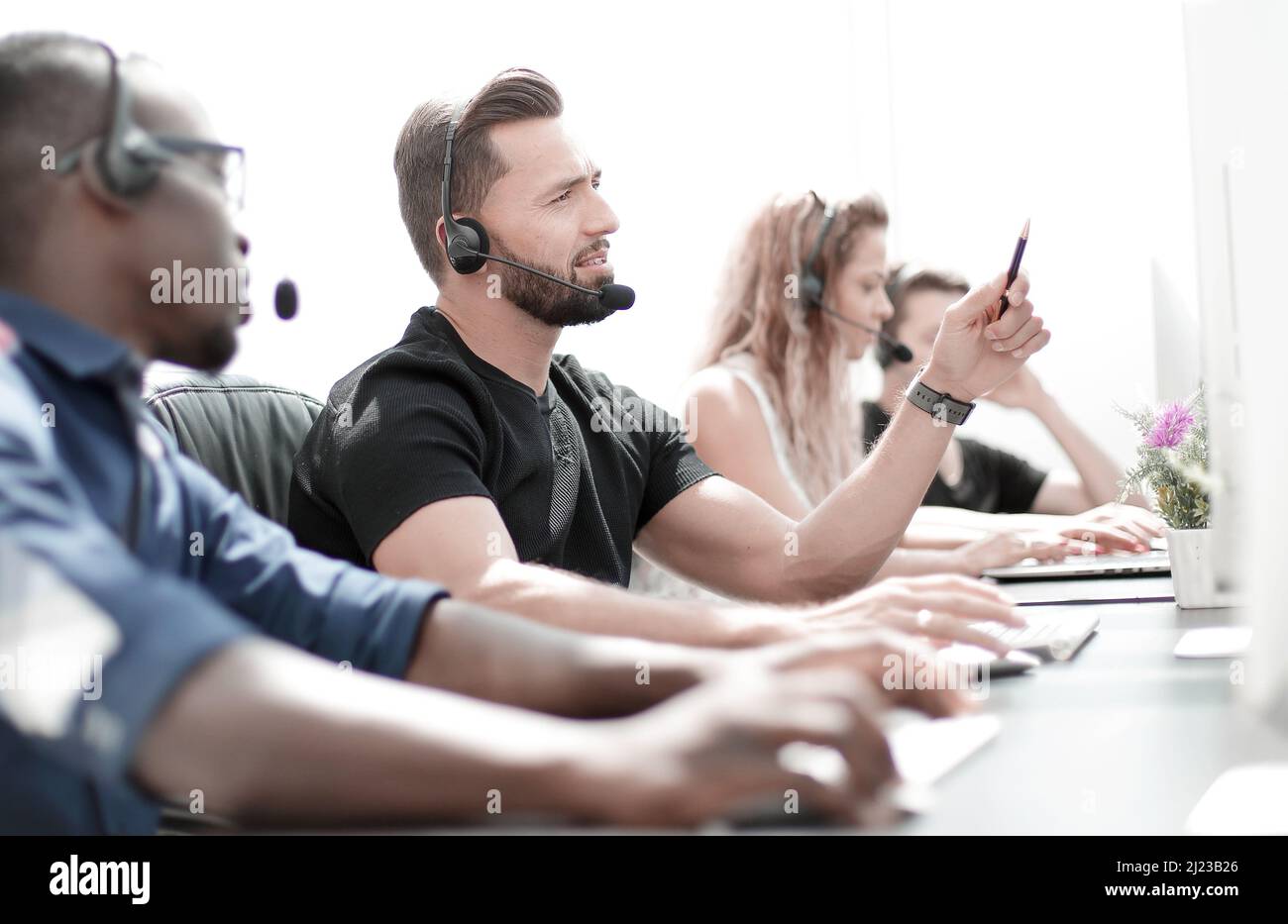 employees of the business center in the workplace Stock Photo - Alamy
