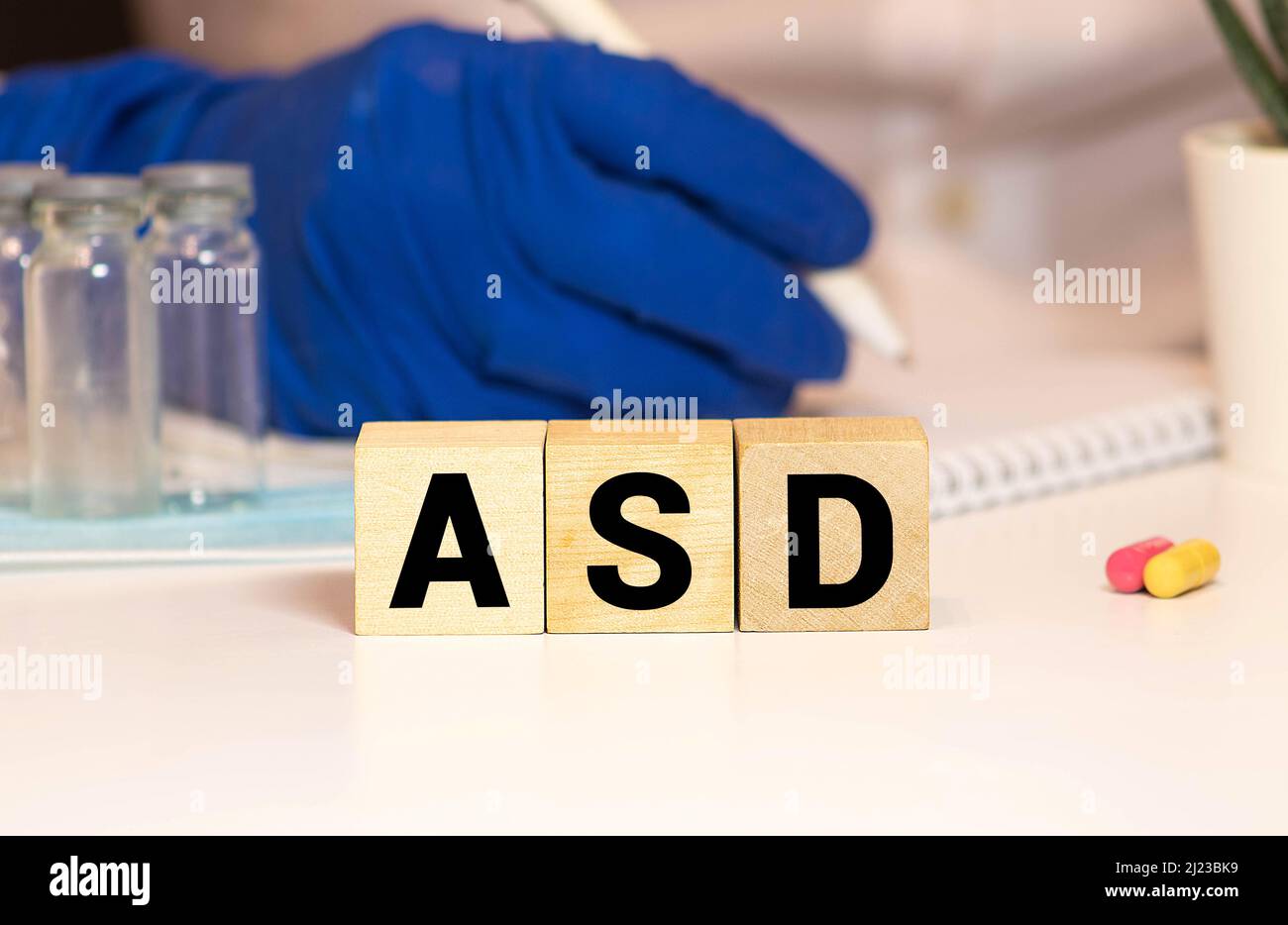 Wooden blocks with the word ASD - Autism Spectrum Disorder ...