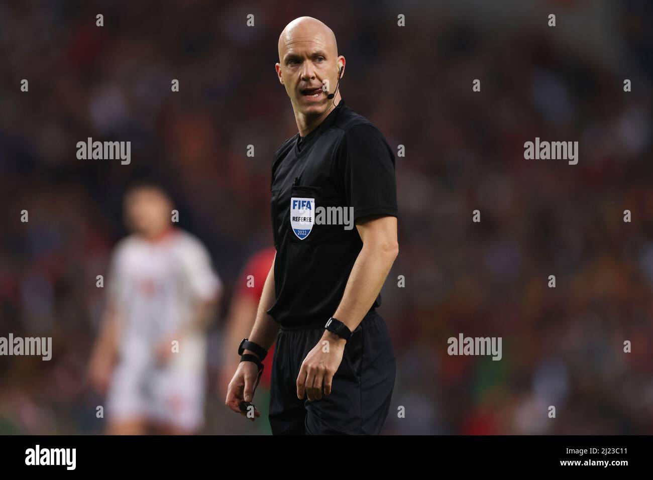 Porto, Portugal, 29th March 2022. The referee Anthony Taylor of England looks on during the FIFA ...