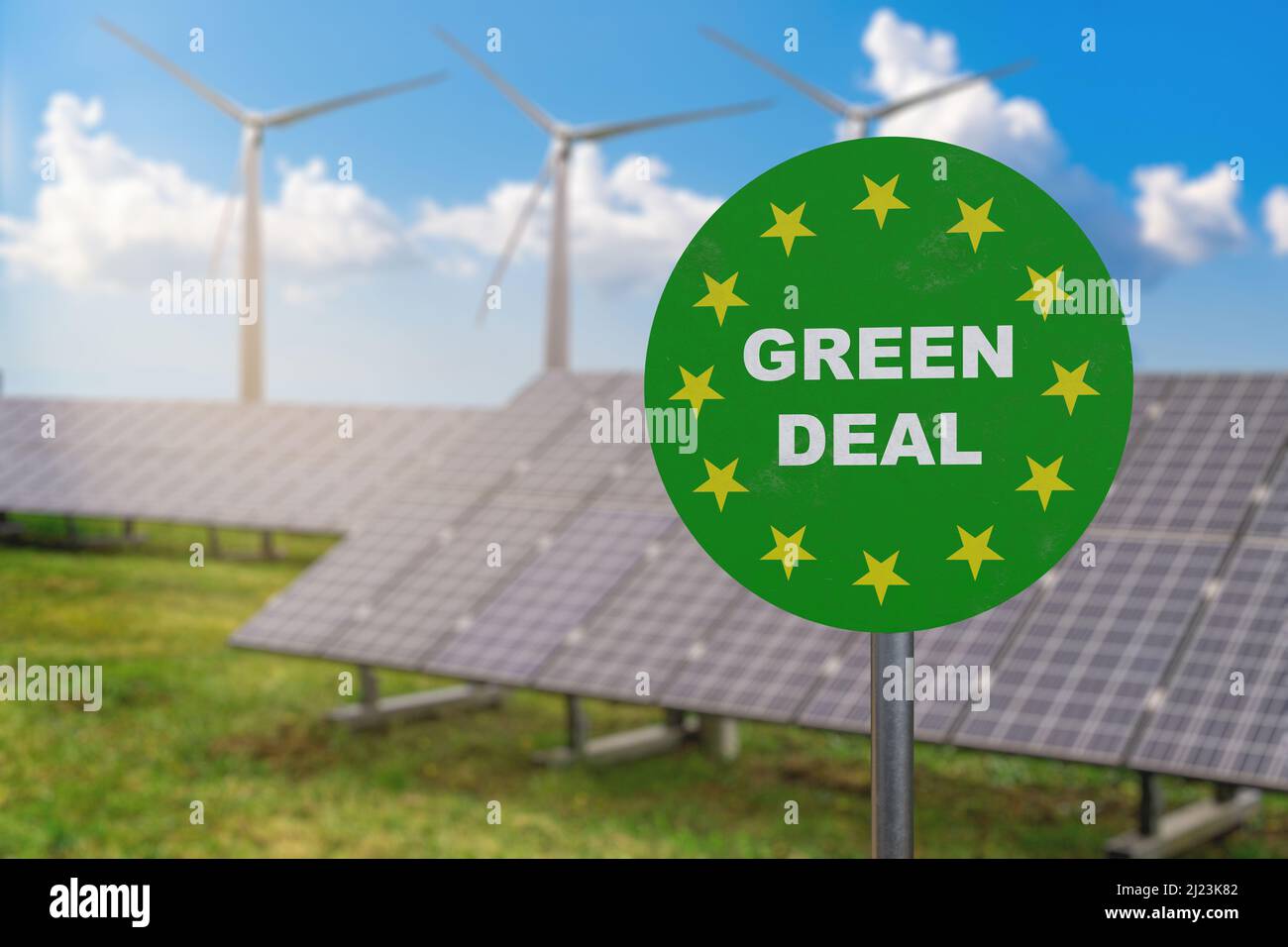 Green deal sign in front of photovoltaic solar power plant. Ecology ...
