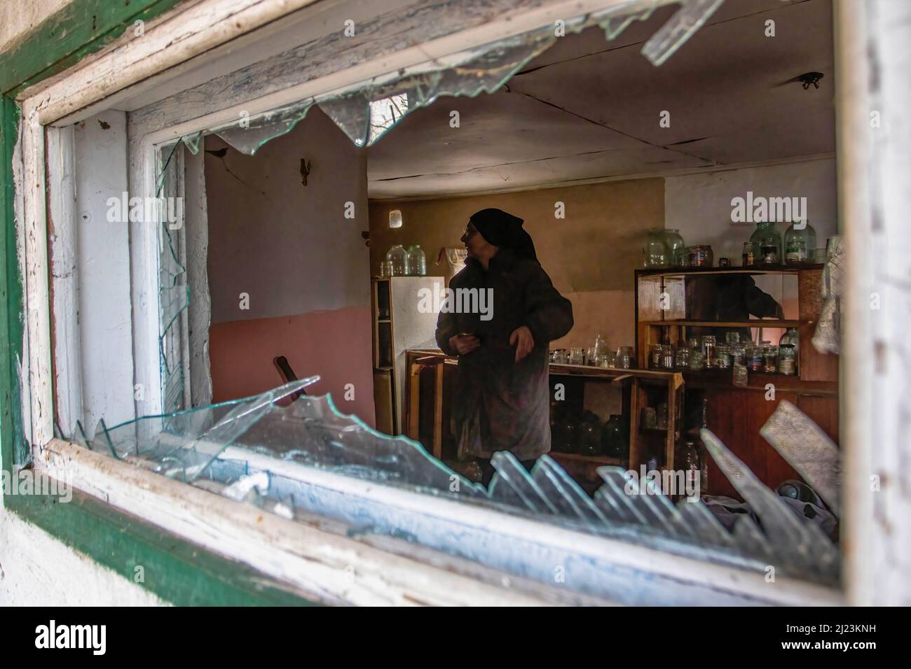 Boyarka, Ukraine. 29th Mar, 2022. A resident of Boyarka looks over ...