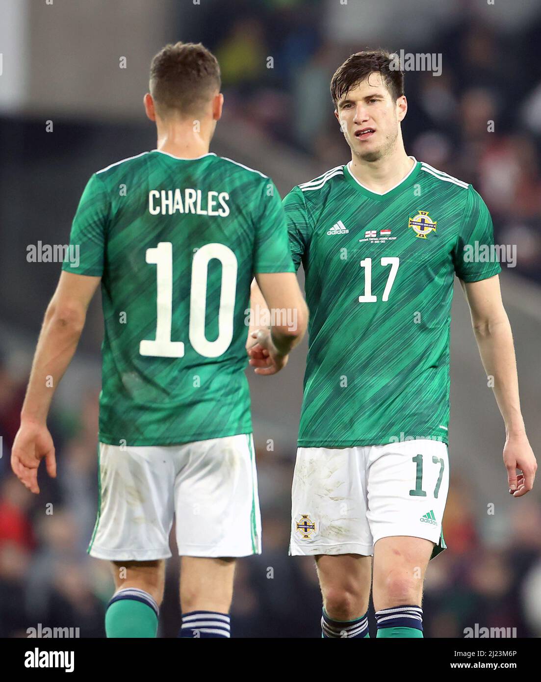 Northern Ireland's Dion Charles (left) and Patrick McNair shake hands ...