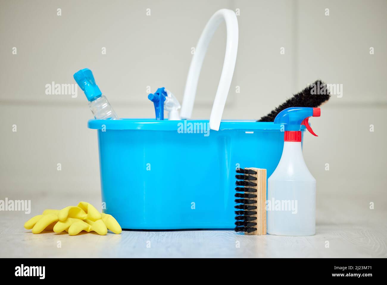 The right tools are essential. Shot of an empty room with a bucket of ...
