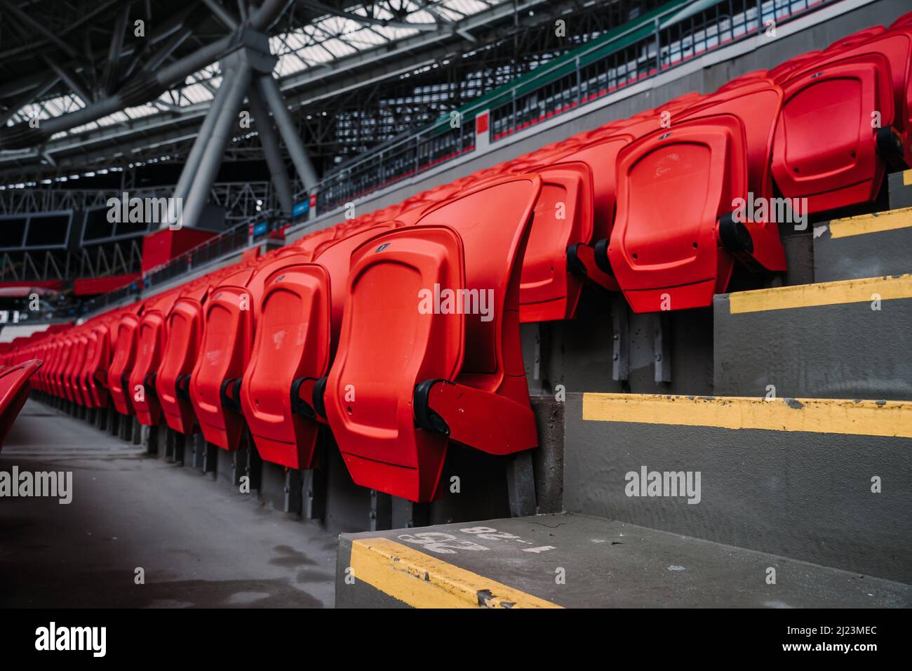 Rows of seats in a football stadium. Bright red stadium seats Stock ...