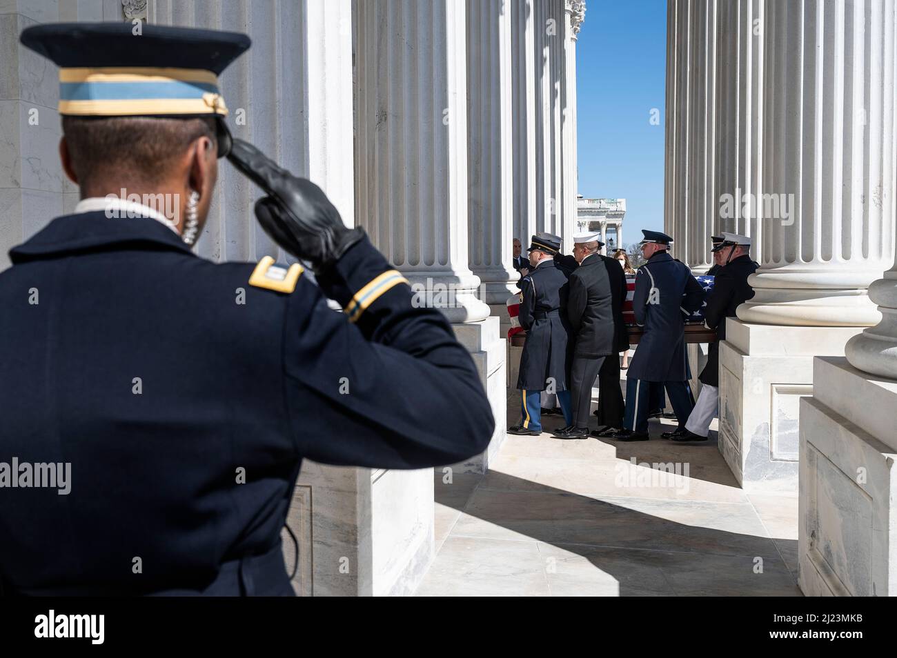An honor guard carries the casket during the Congressional Tribute and ...