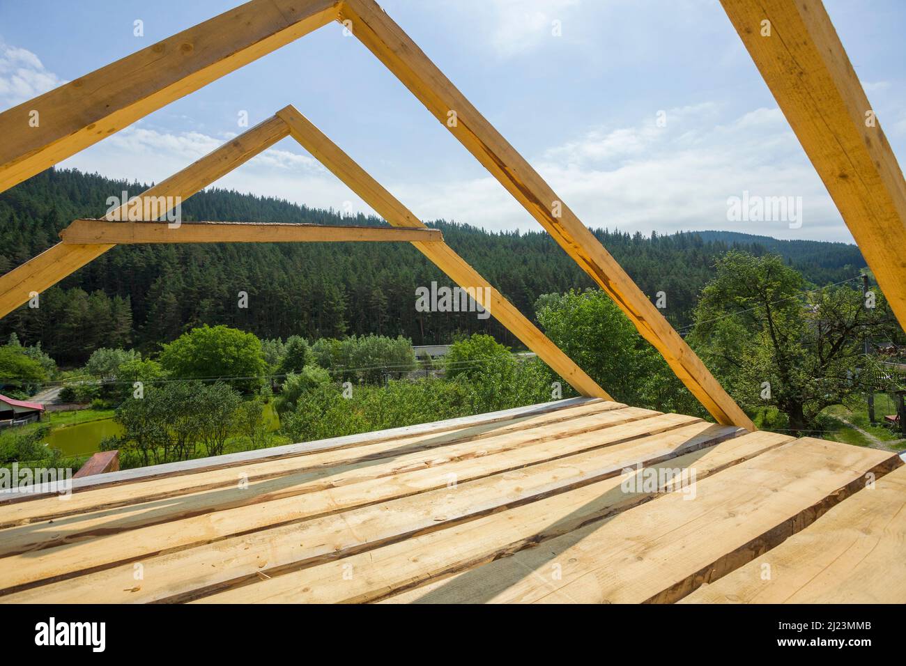 new house construction in nature, forest background Stock Photo - Alamy