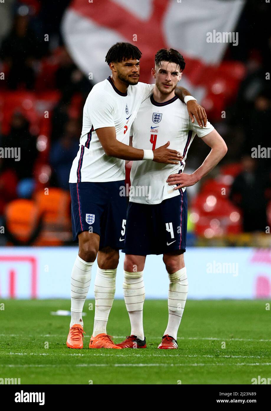 London, England, 29th March 2022. Tyrone Mings of England and Declan ...