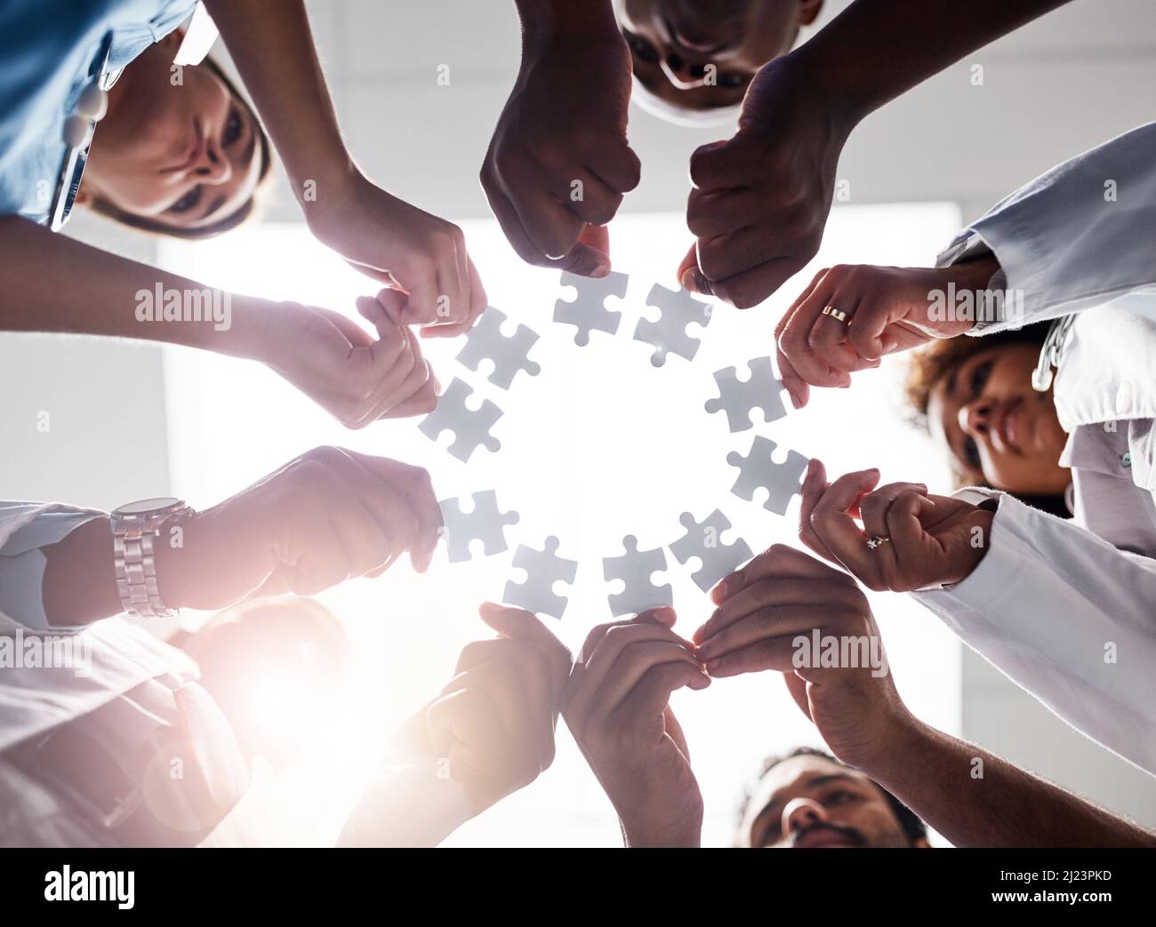 Everyone plays their part here. Low angle shot of a group of doctors ...