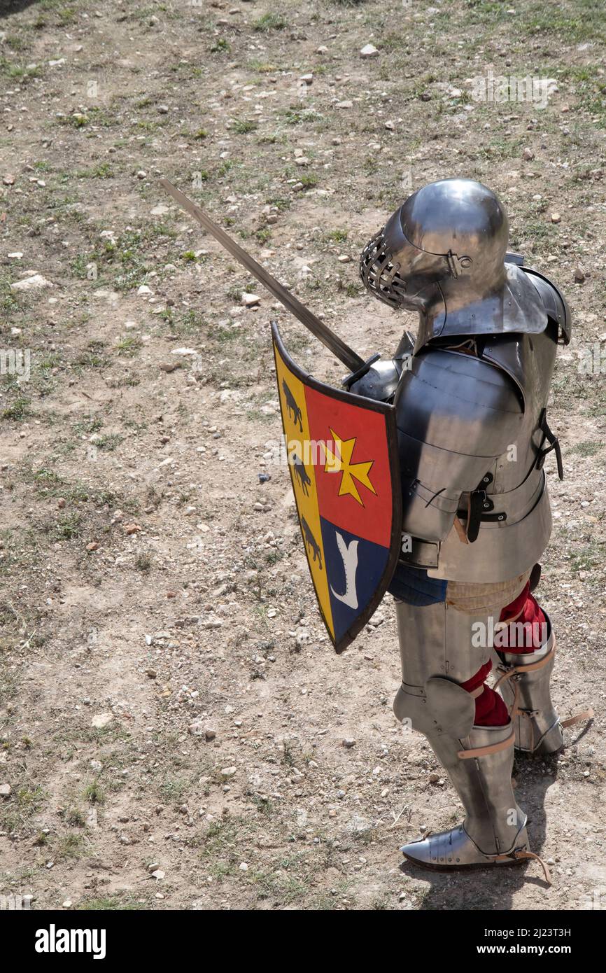 a man with a medieval armour and blade Stock Photo - Alamy