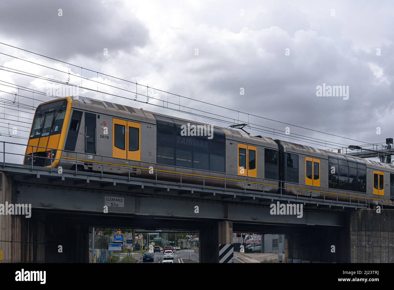 A Tangara train belonging to Sydney Trains crossing a bridge in ...