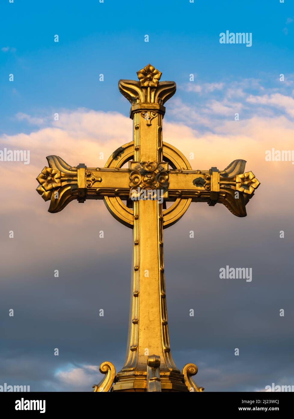 The historic gilded cross in front of the Basilica of the Apparitions ...