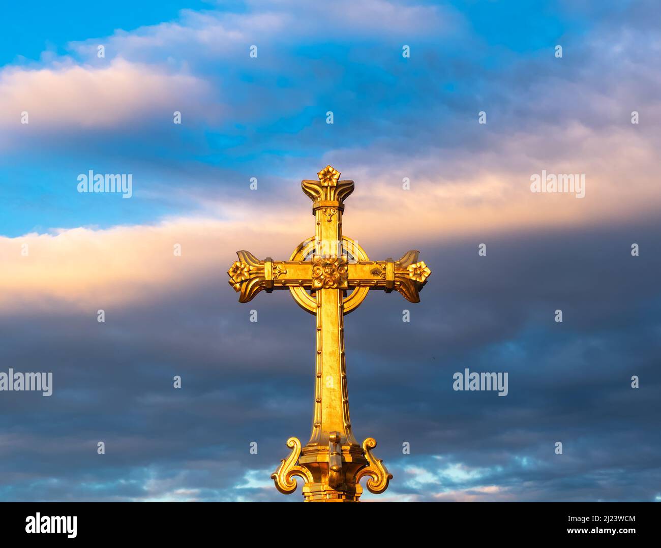 The historic gilded cross in front of the Basilica of the Apparitions ...