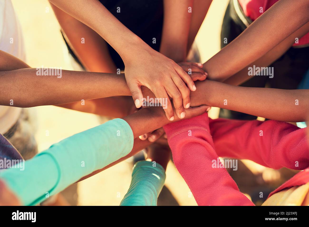 Happy kids huddle hi-res stock photography and images - Alamy