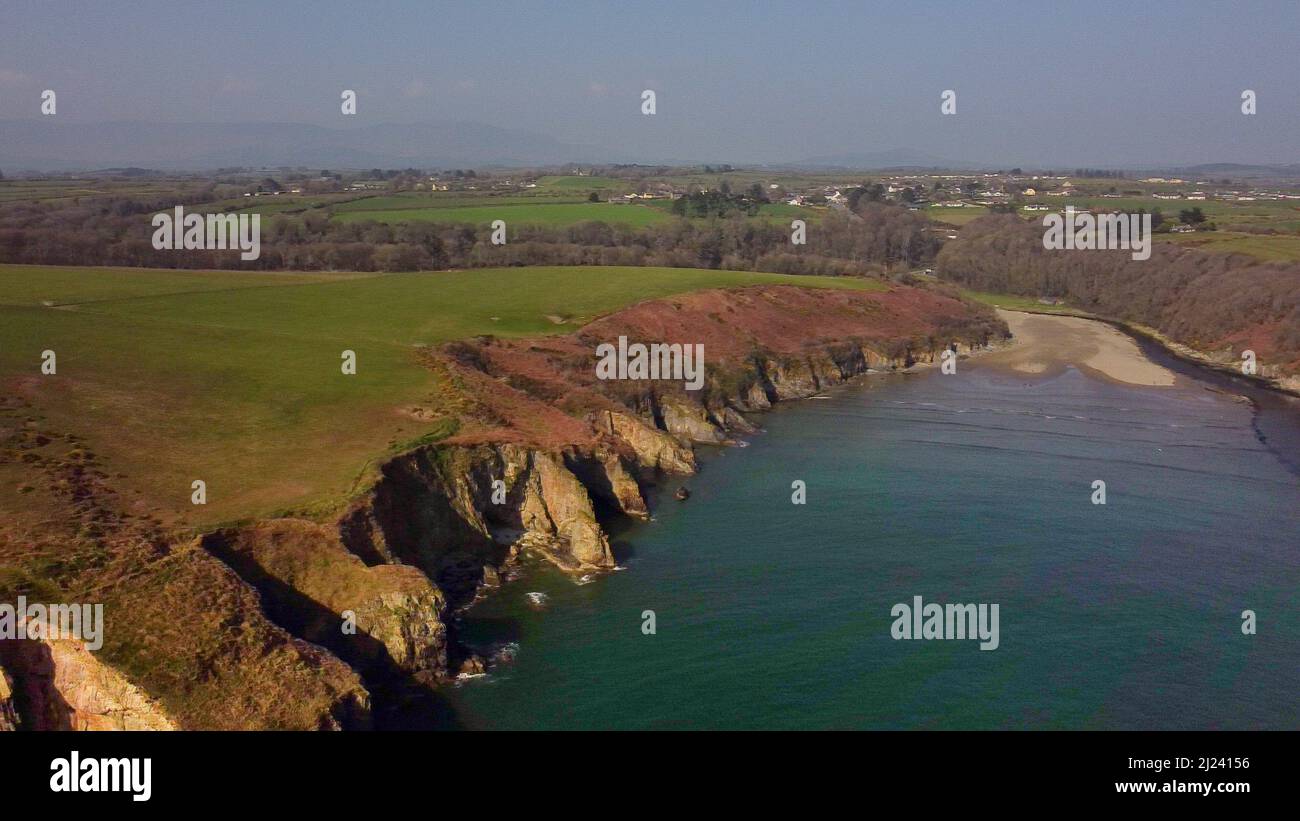 beach between cliffs from drone over Stradbally Cove, Cooper Coast ...