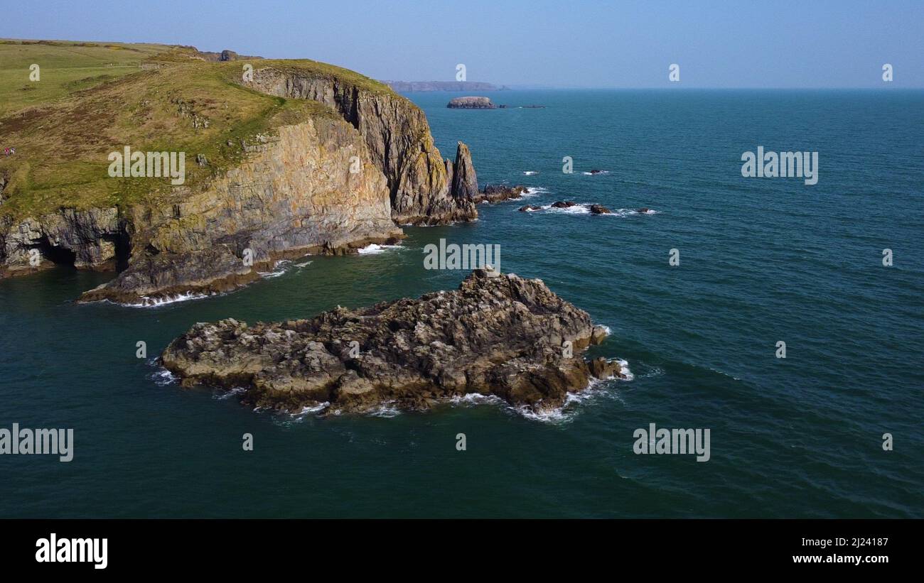 wild cliffs of the cooper coast, waterford ireland. in drone flight ...