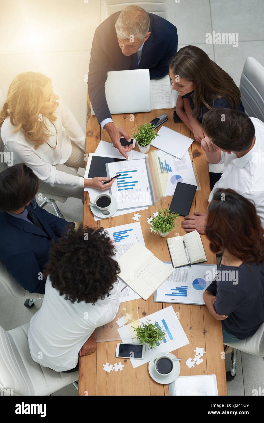 Merging their ideas to create unfailing plans for success. High angle ...