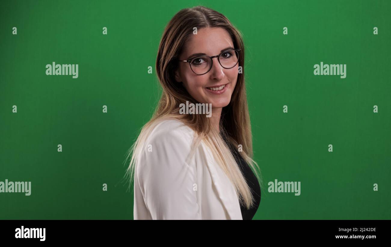 Young pretty woman in her mid-20s laughs at the camera Stock Photo - Alamy