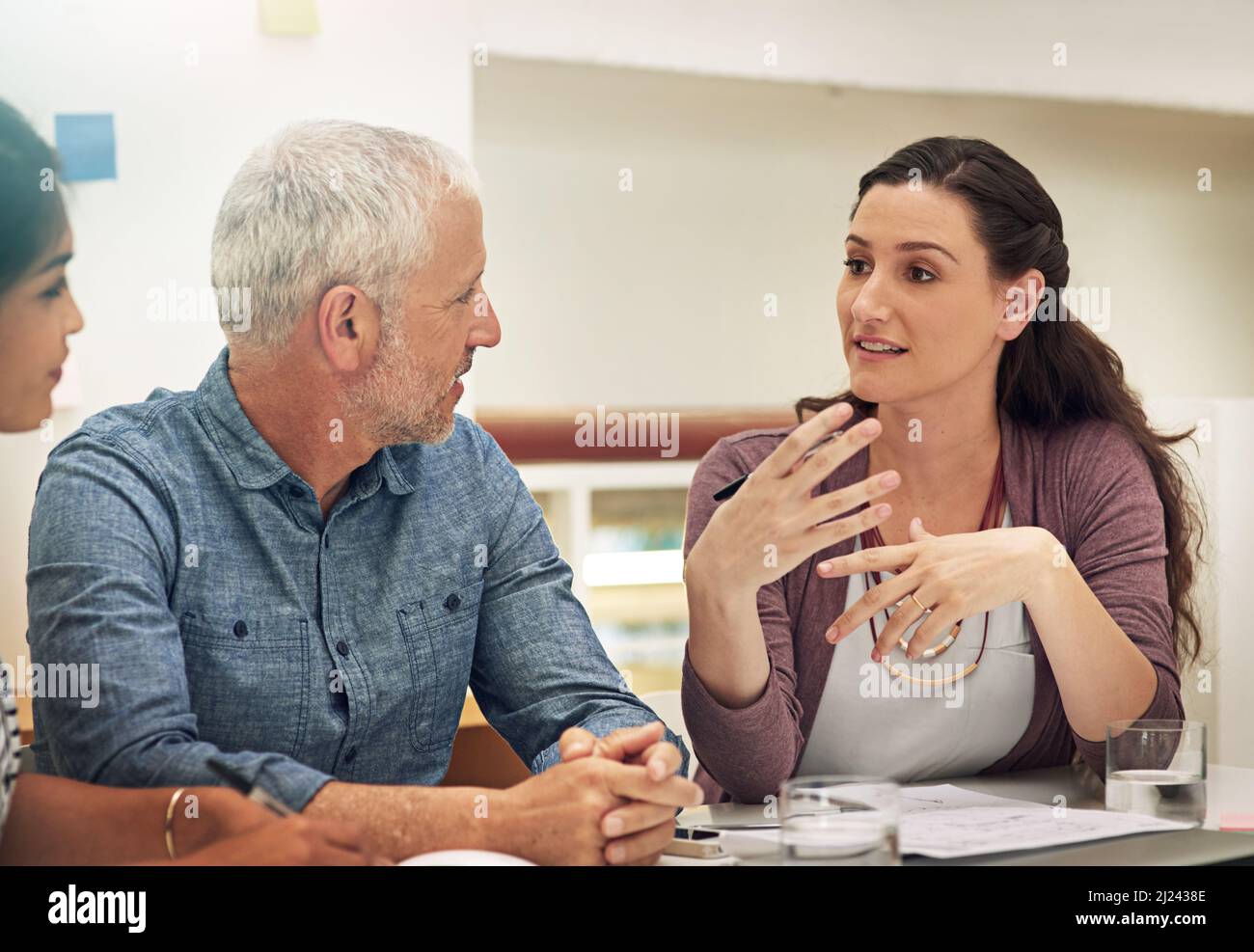 Id like to offer a few suggestions. Shot of a team of colleagues having ...